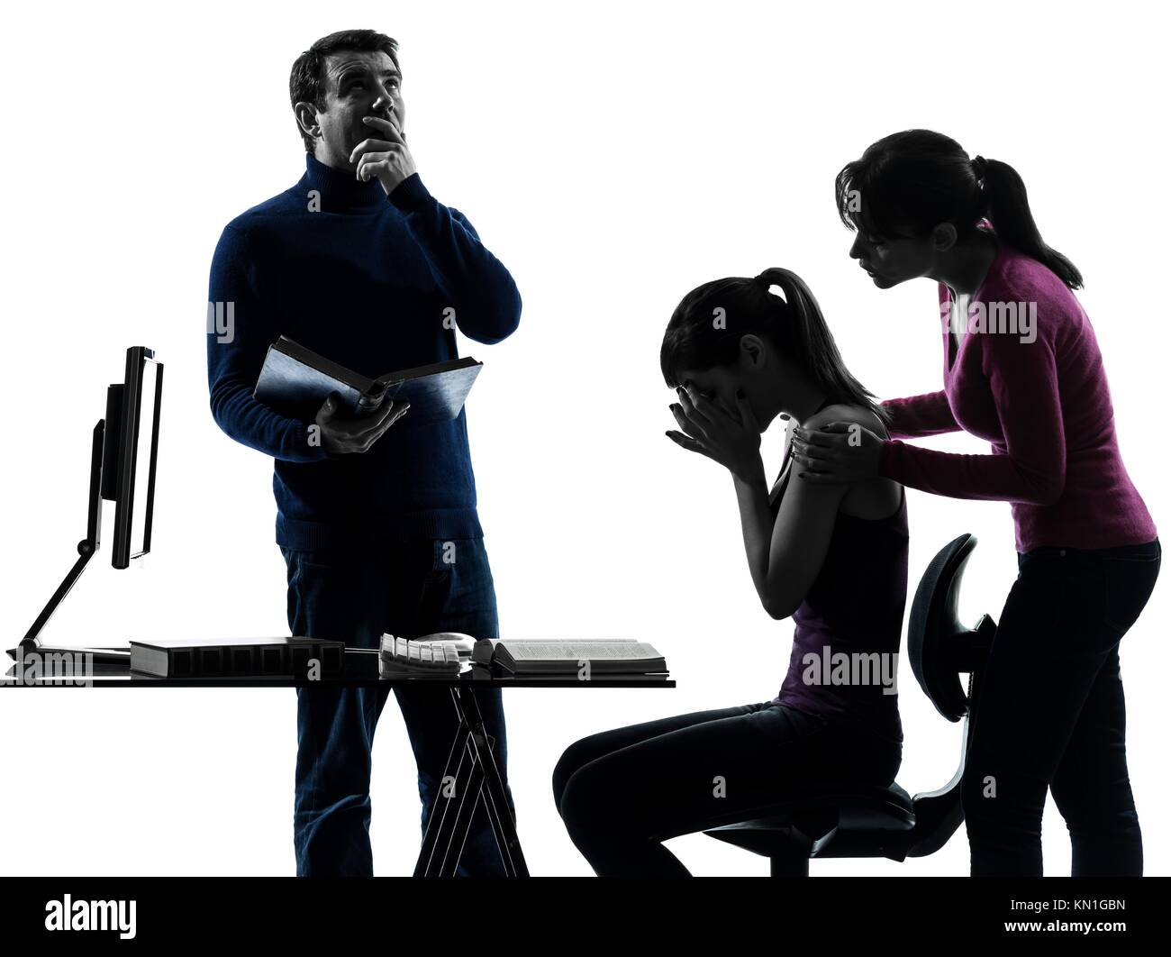 one caucasian family father mother daughter helping homework in ...