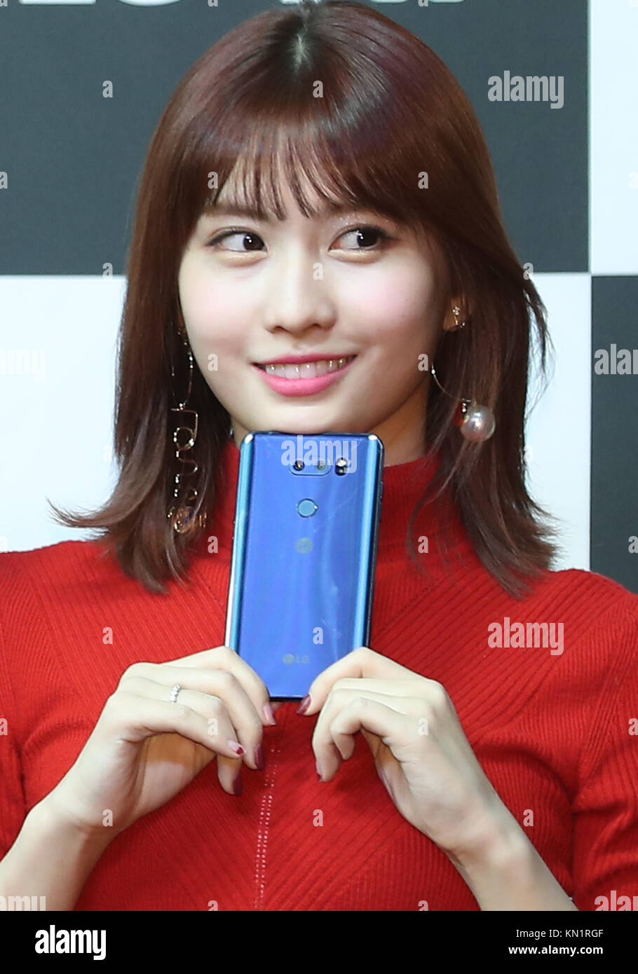 10th Dec, 2017. Momo of TWICE Momo of girl group TWICE attends an event in Seoul on Dec. 9, 2017 ...