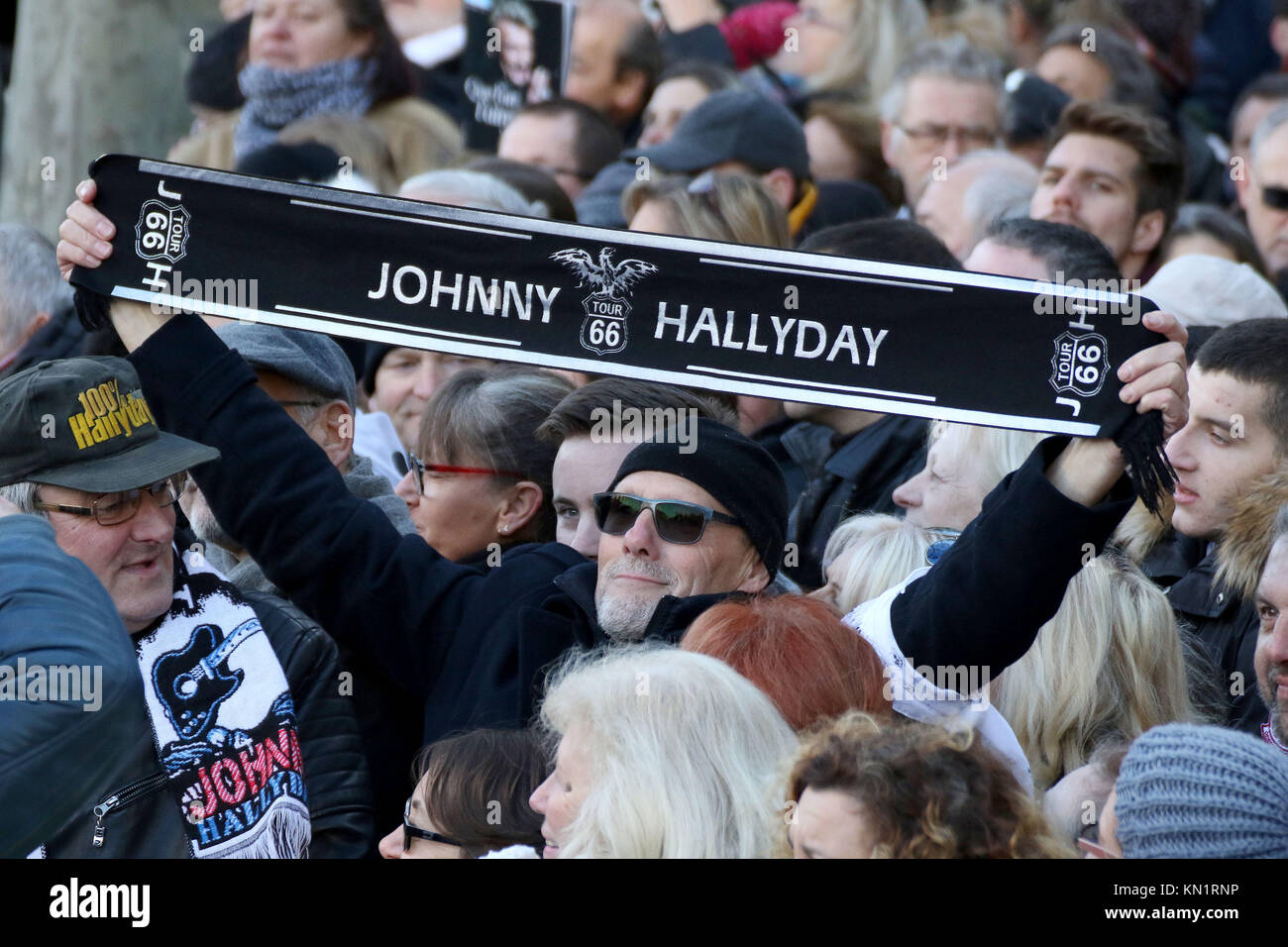 Paris, France. 9th Dec, 2017. A Johnny Hallyday's fan seen holding a ...