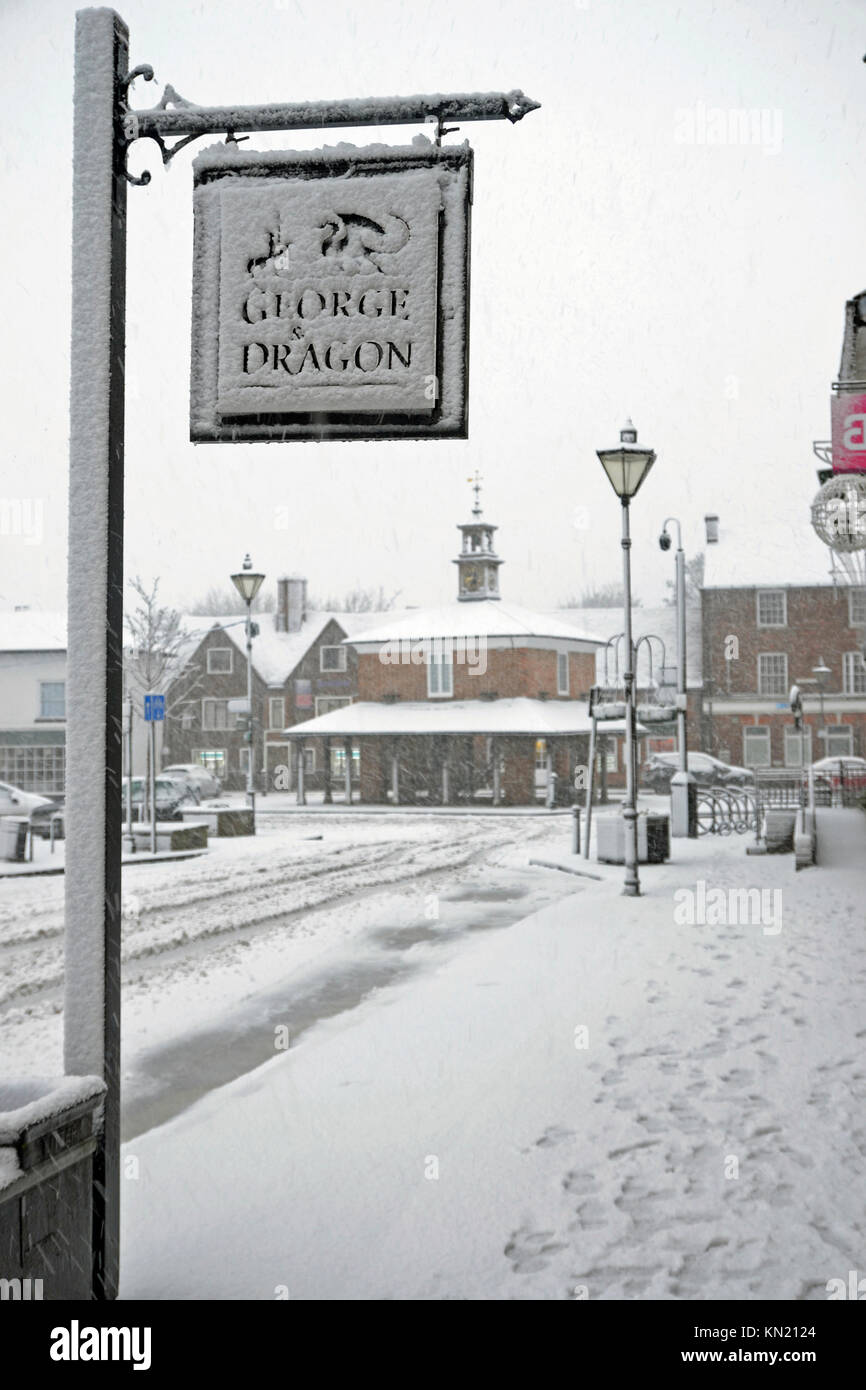 George and Dragon sign covered in snow. Princes Risborough High Street ...