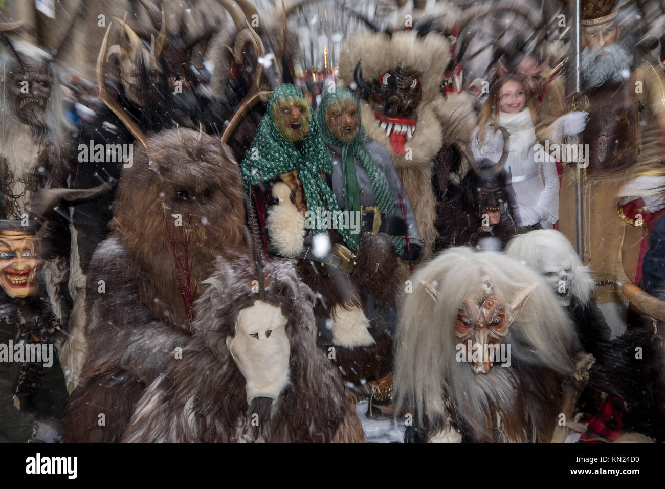 Munich, Germany. 10th Dec, 2017. People wearing scary masks during the ...