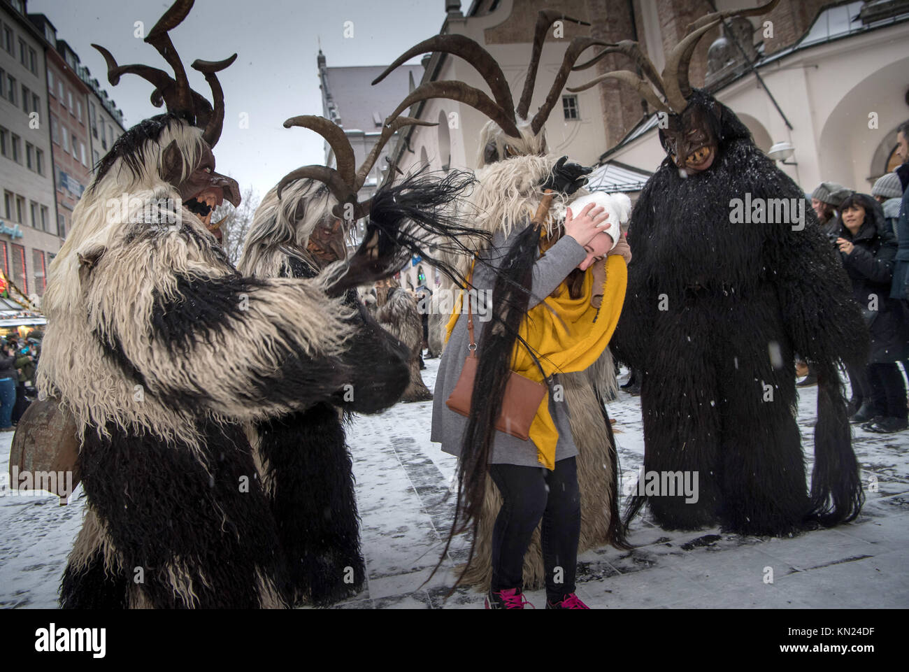 Munich, Germany. 10th Dec, 2017. People wearing scary masks during the ...