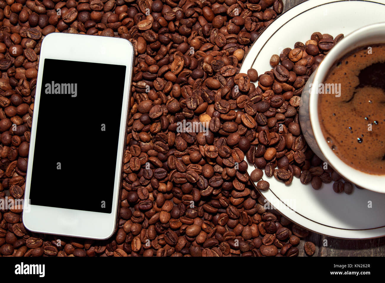 Coffee with smartphone background Stock Photo - Alamy