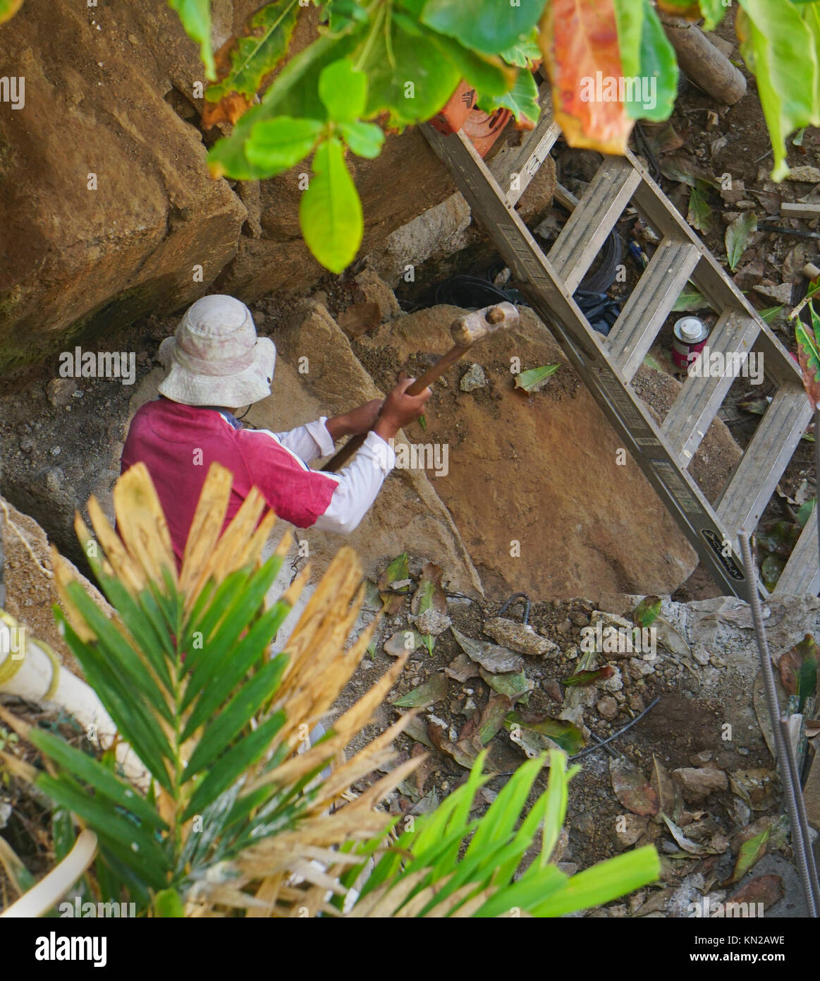 Hammering rocks hi-res stock photography and images - Alamy