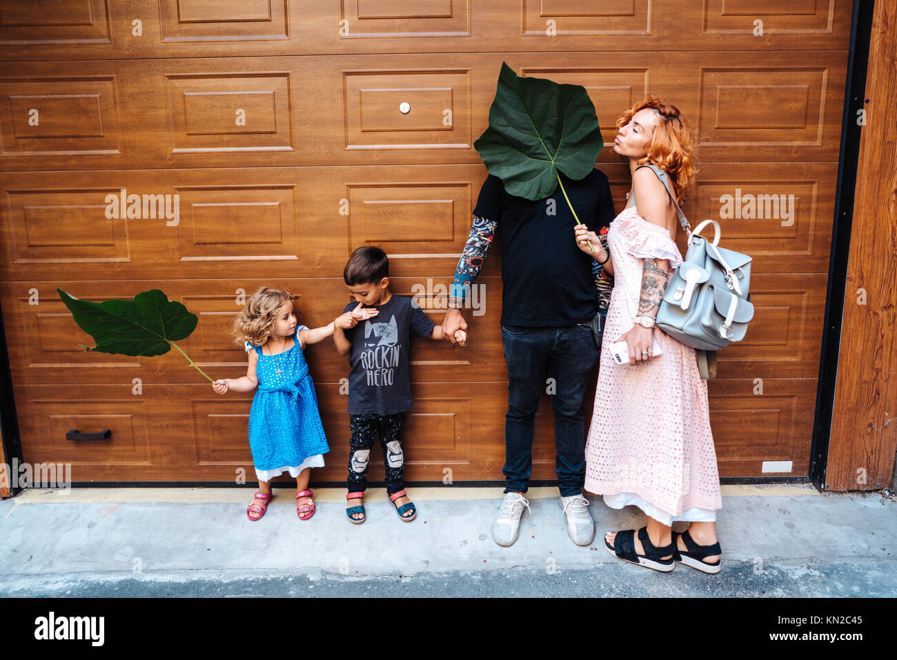 Family having fun on the street Stock Photo - Alamy