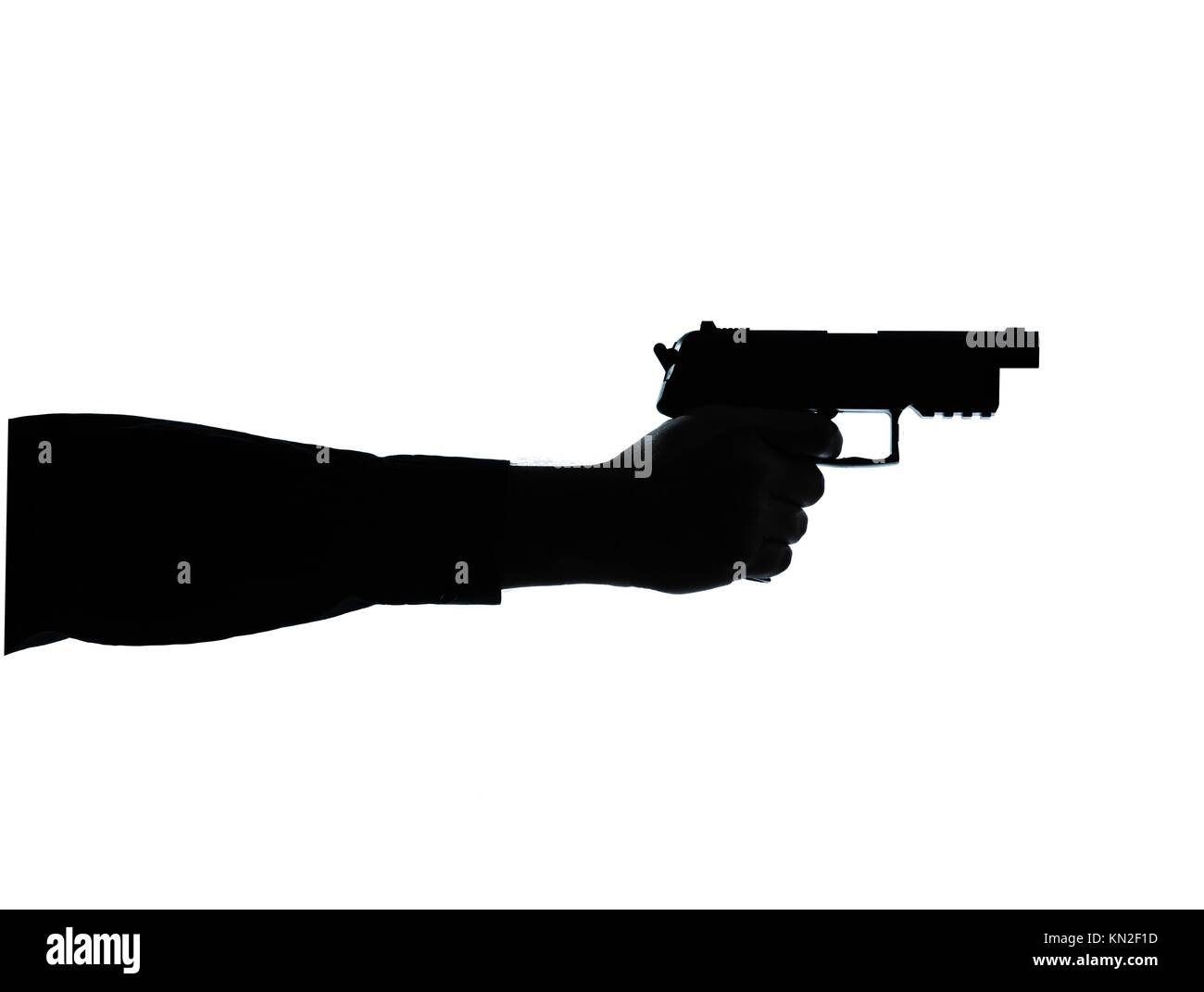one caucasian close up detail one man hand aiming gun silhouette in ...