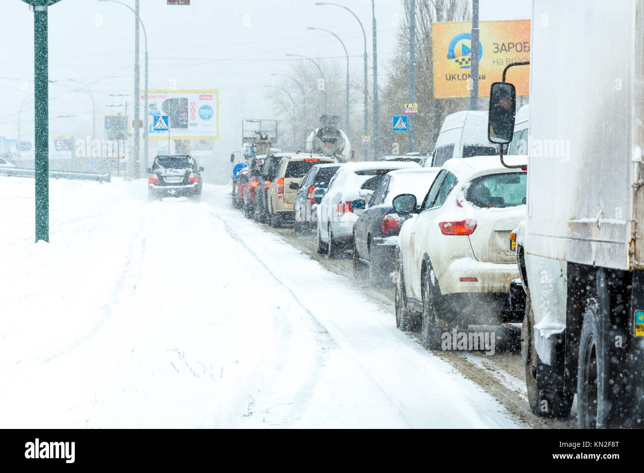 Traffic jam caused by heavy snowfall Stock Photo - Alamy