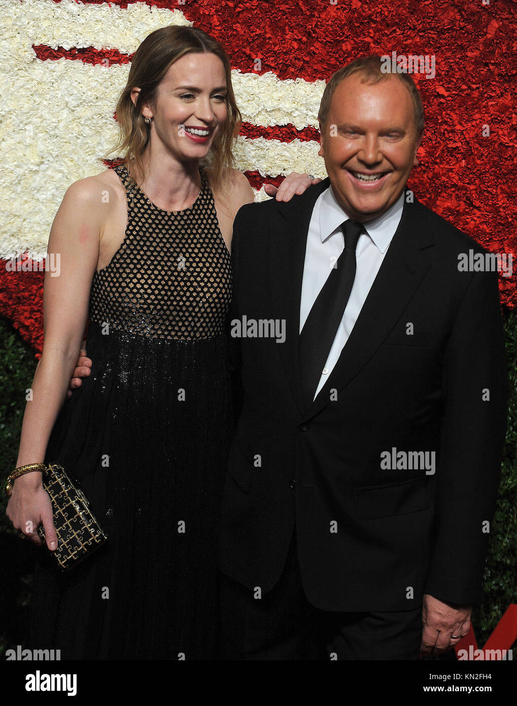 NEW YORK, NY - OCTOBER 15: Emily Blunt, Michael Kors attends God's Love ...