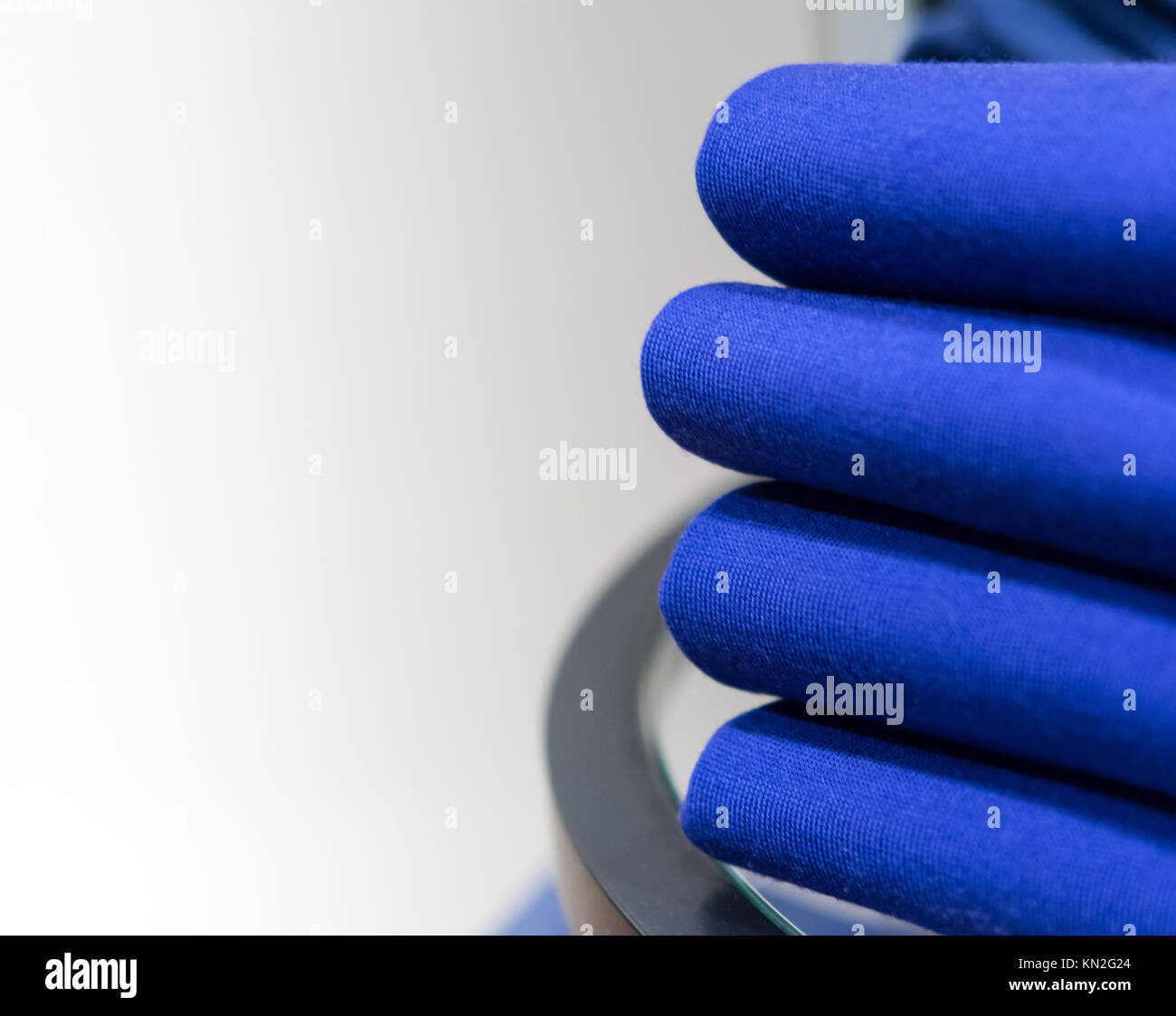 stack of neatly folded clothes on the counter Stock Photo - Alamy