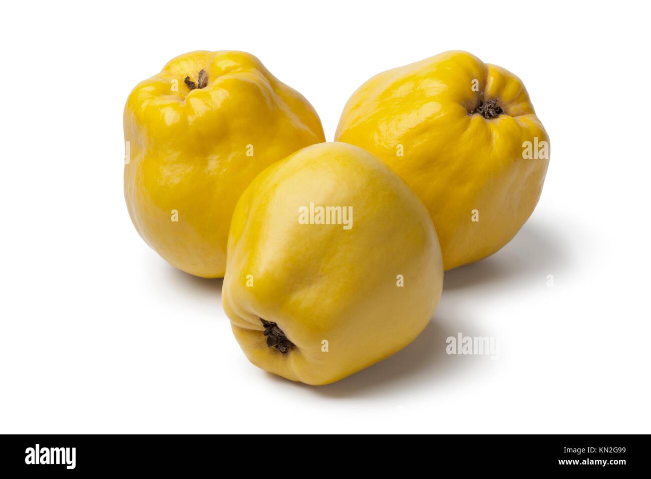 Fresh yellow Quinces on white background Stock Photo - Alamy