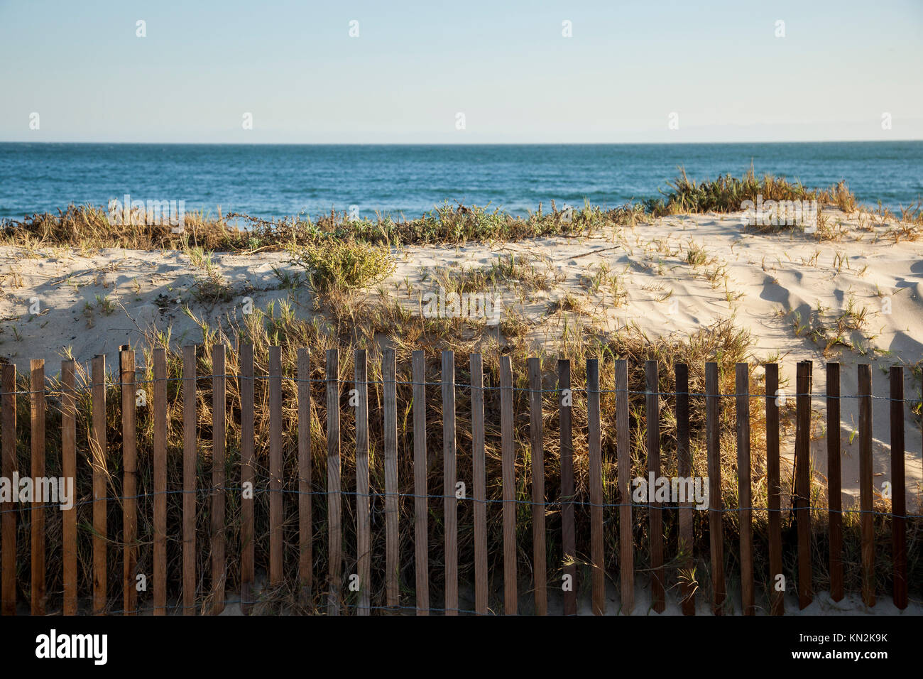 An idyllic California beach scene with wood fence Stock Photo - Alamy
