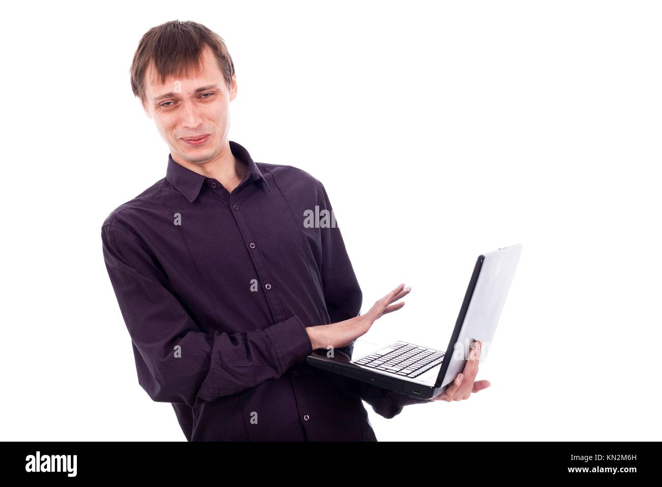 Funny weirdo man holding laptop, isolated on white background Stock ...