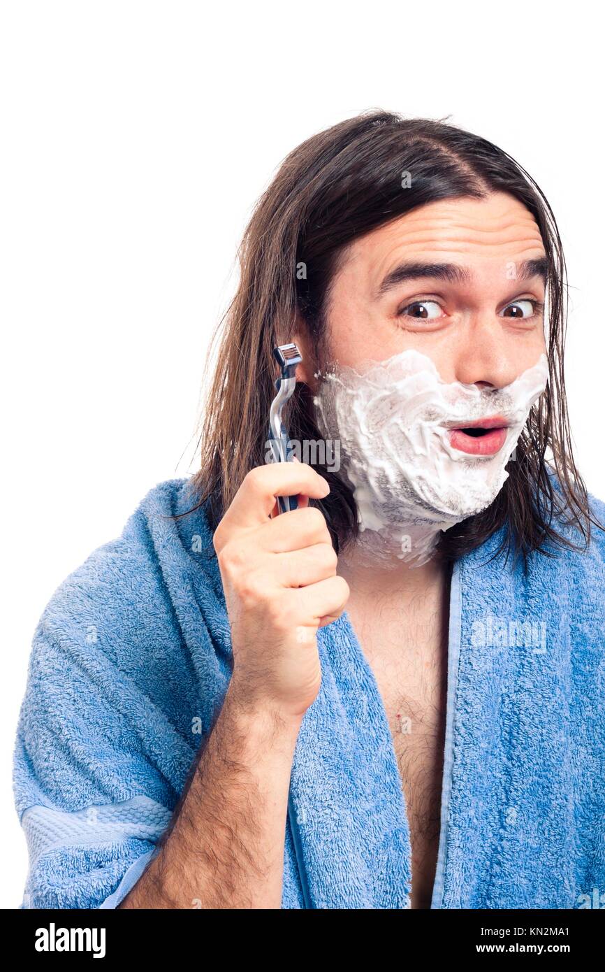 Happy funny longhaired man going to shave after bath, isolated on white ...
