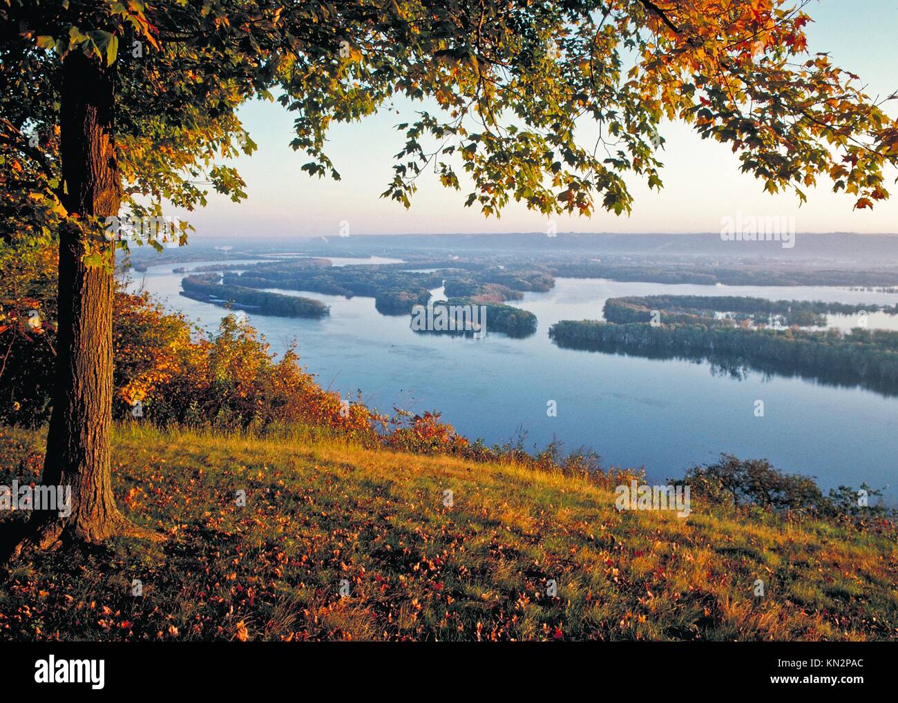 Autumn foliage surrounds the river at the Pikes Peak State Park ...
