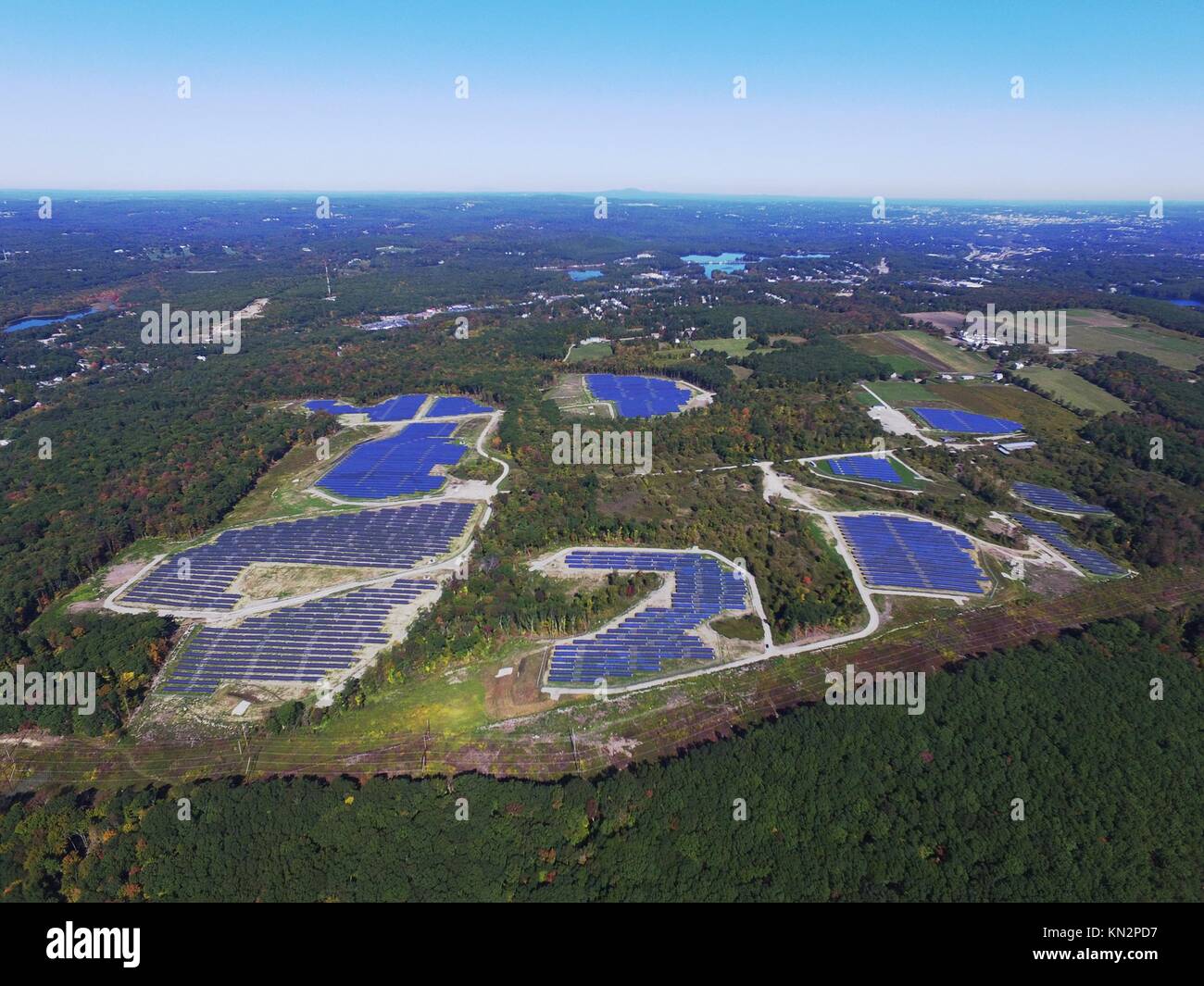 Aerial view of a solar panel farm being built on a former piggery ...