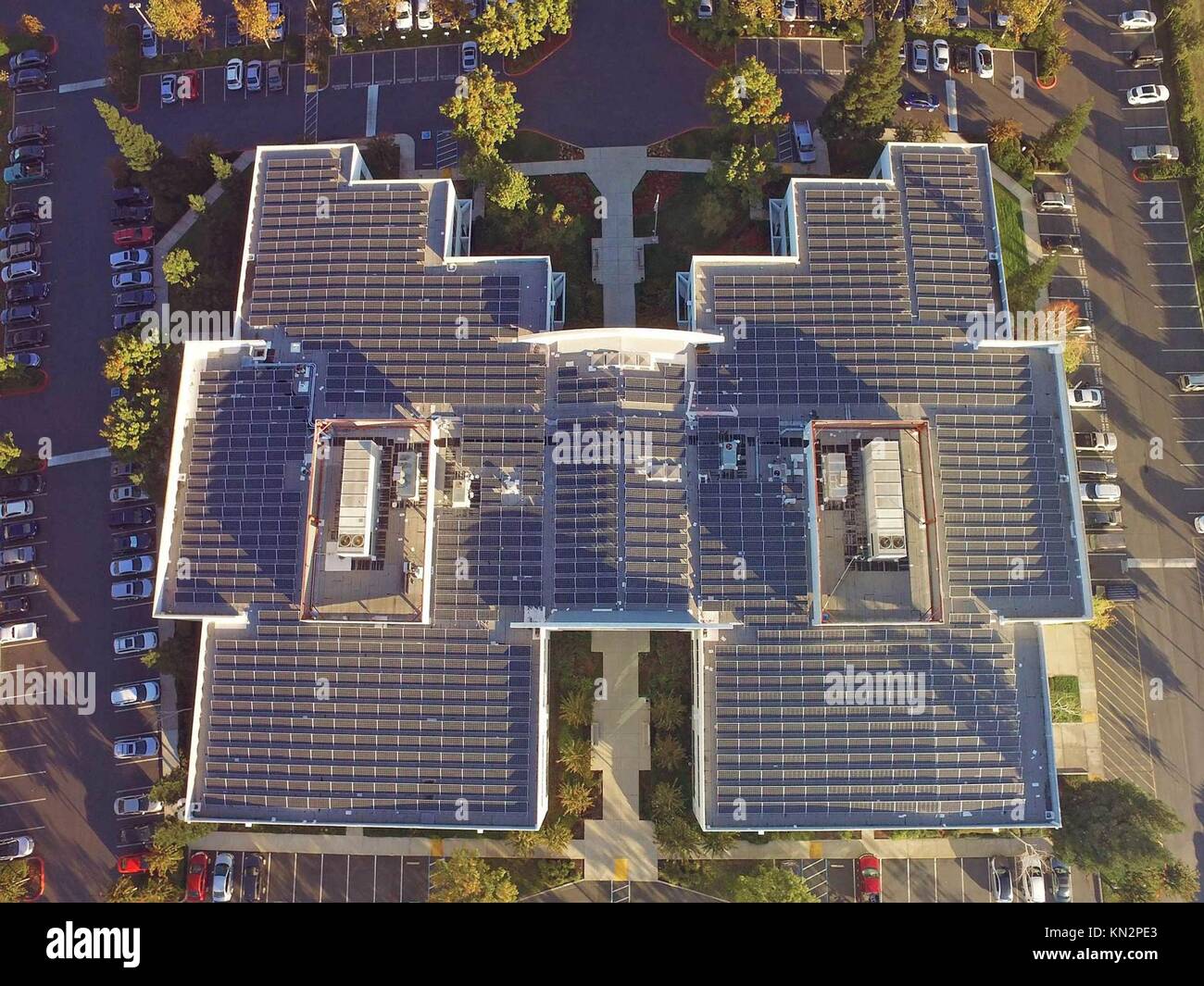 Aerial view of rows of solar panels on the rooftop of the Nome ...