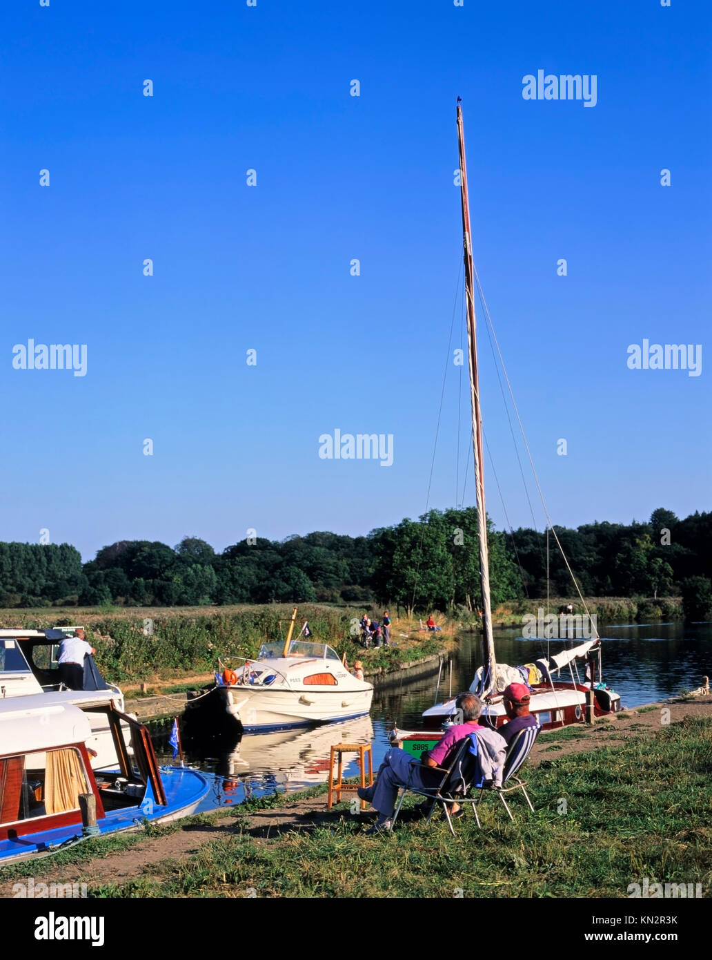 Sitting at the waters edge, River Yare, The Broads National Park ...