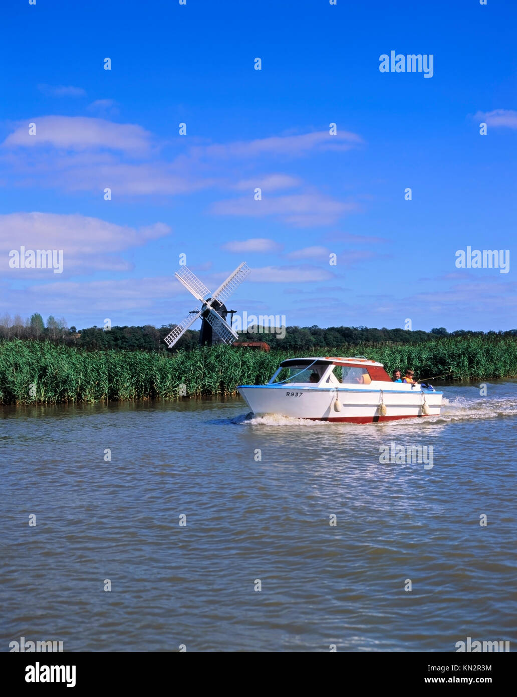Broads cruiser passing Herringfleet Mill, River Waveney, The Broads ...