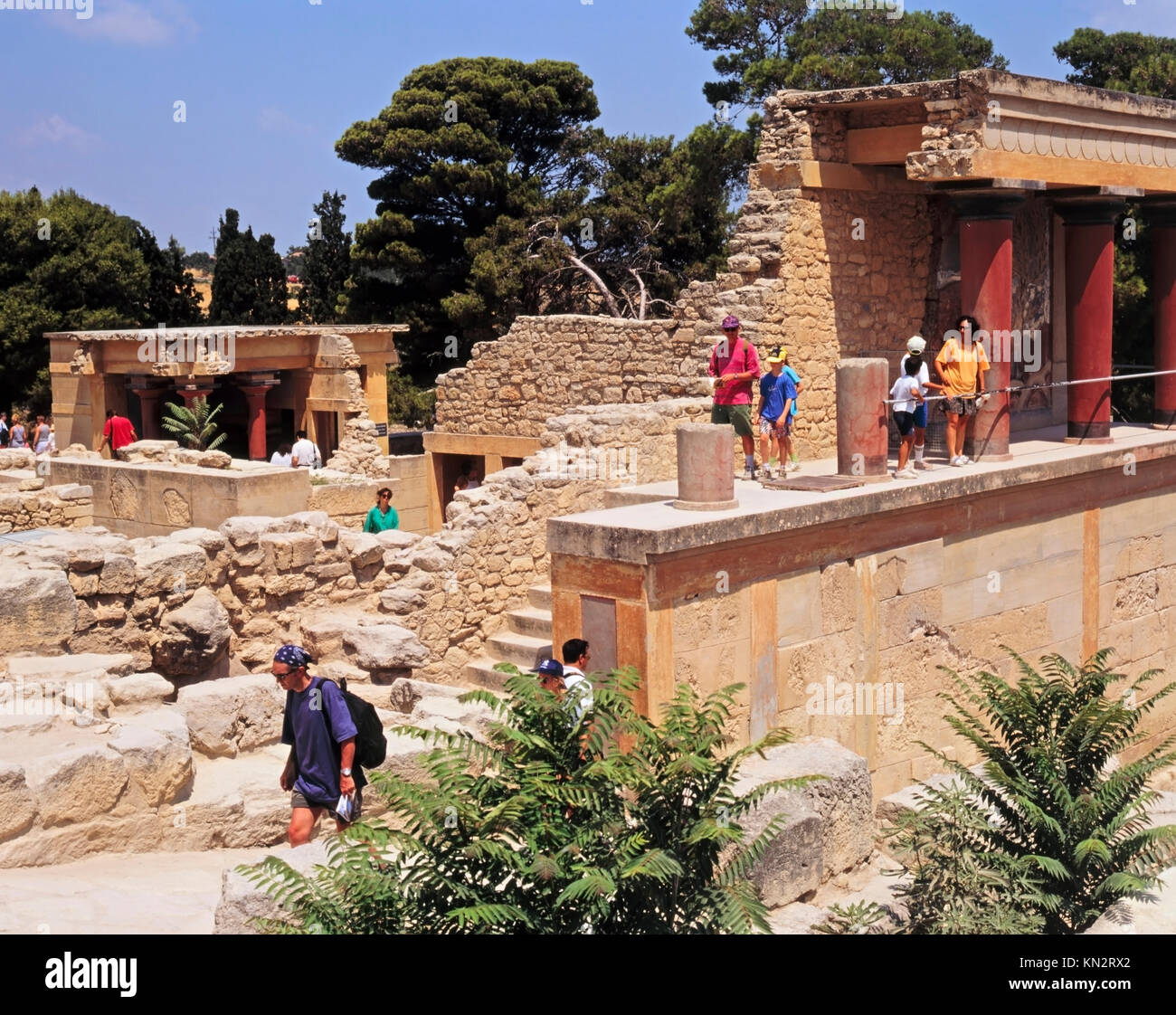 Tourists visiting the Palace of Knossos, the archaeological site of ...