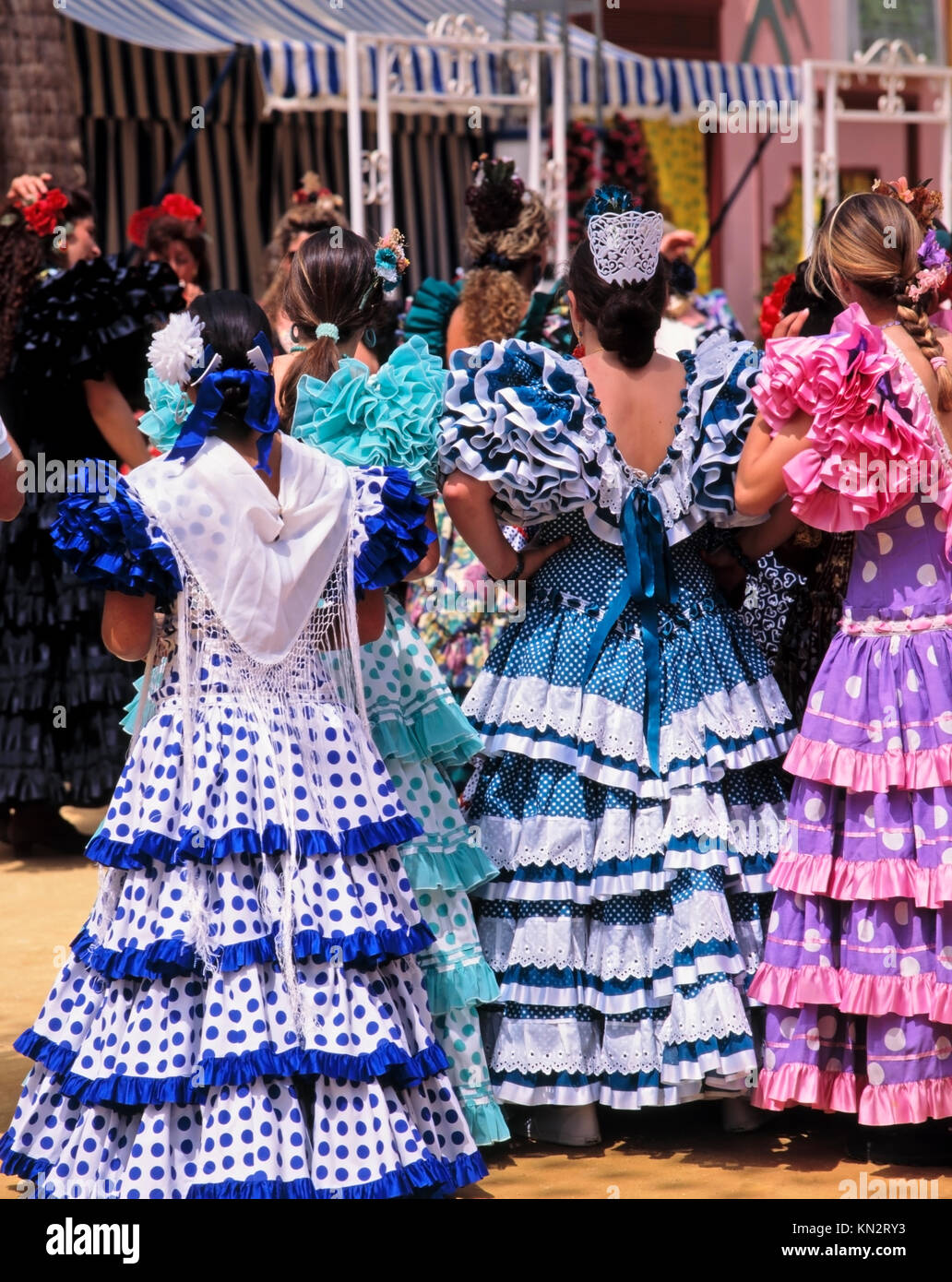 Jerez Horse Fair, Feria del Caballo, woman dressed in trajes de gitanas (gypsy dresses), Jerez ...