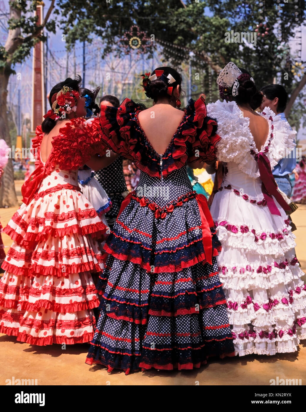 Jerez Horse Fair, Feria del Caballo, ladies dressed in trajes de gitanas (gypsy dresses), Jerez ...