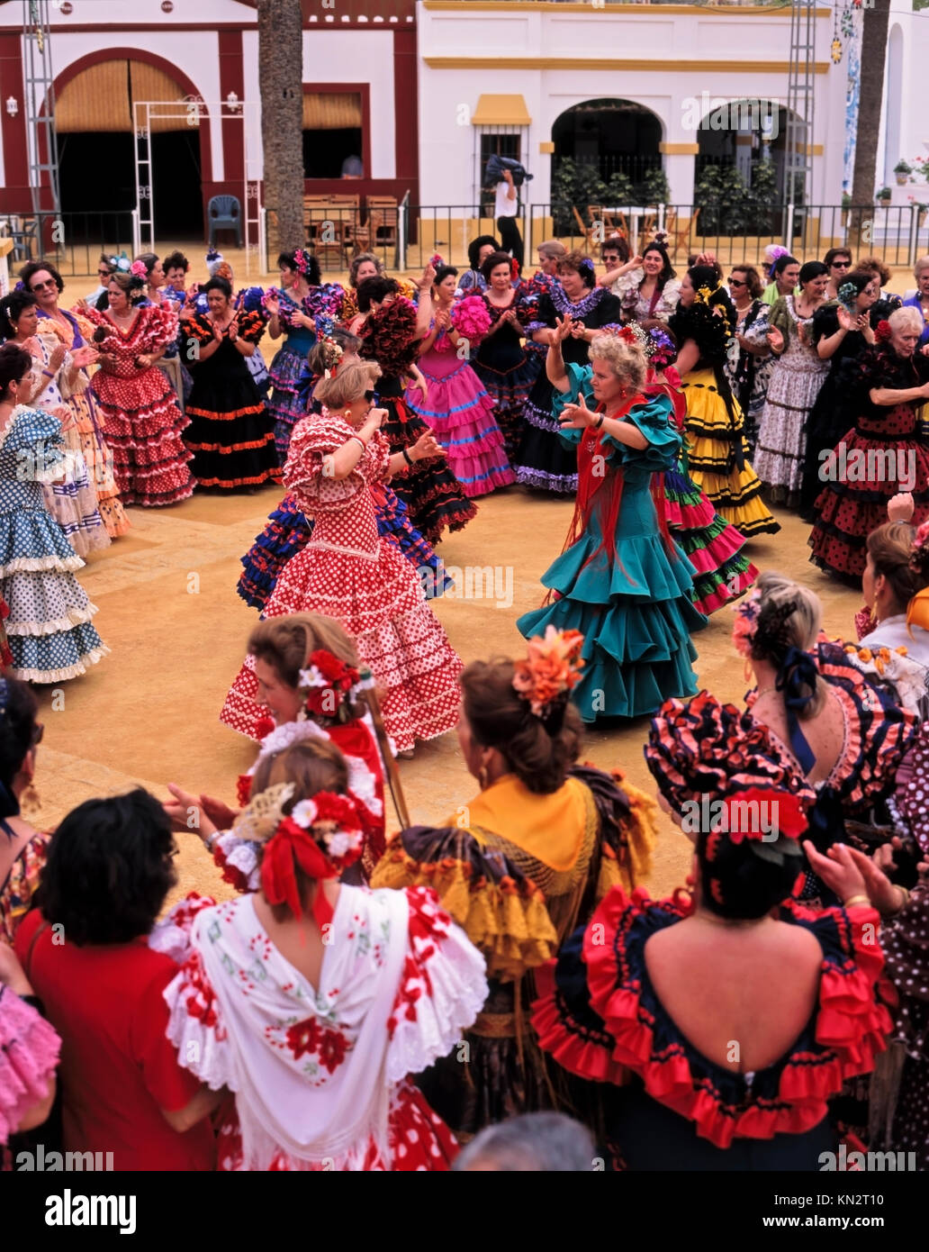Jerez Horse Fair, Feria del Caballo, ladies flamenco dancing dressed in ...