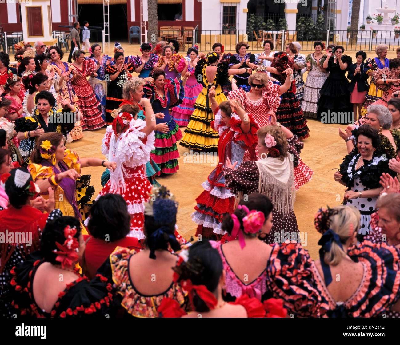 Jerez Horse Fair, Feria del Caballo, ladies flamenco dancing dressed in ...