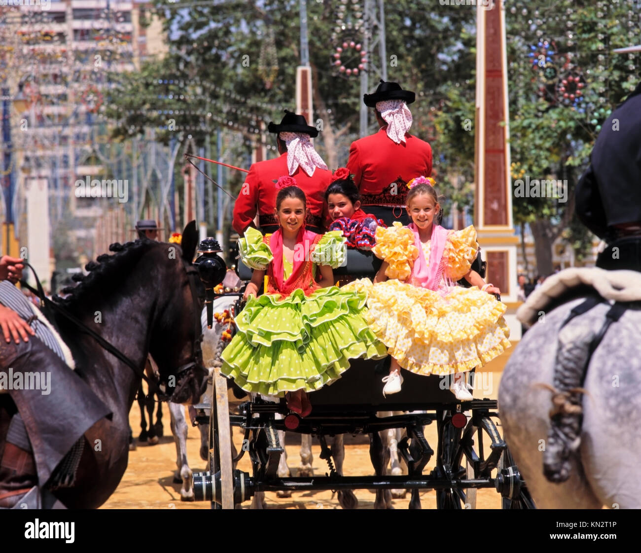 Jerez Horse Fair, Feria del Caballo, young girls on carriage dressed in ...