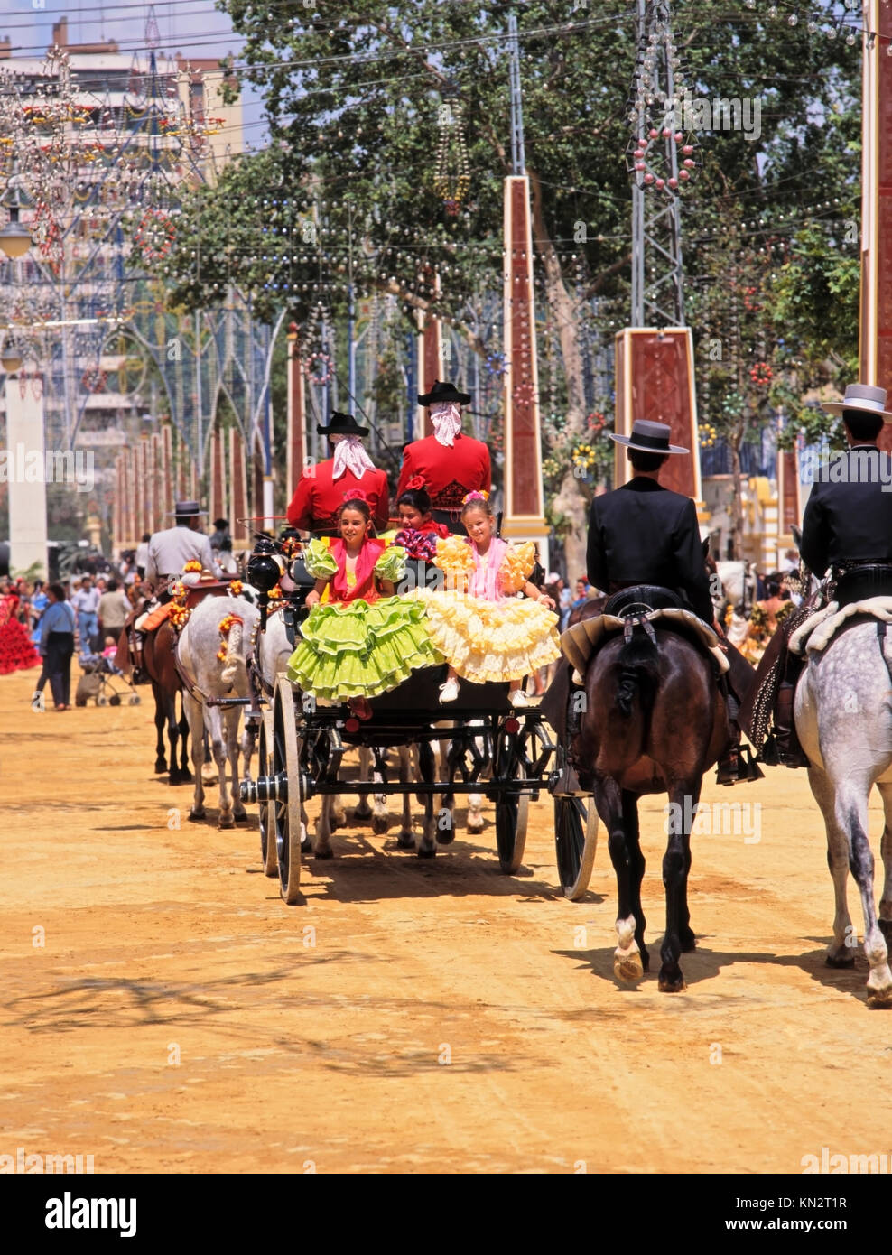 Jerez Horse Fair, Feria del Caballo, young girls on carriage dressed in ...