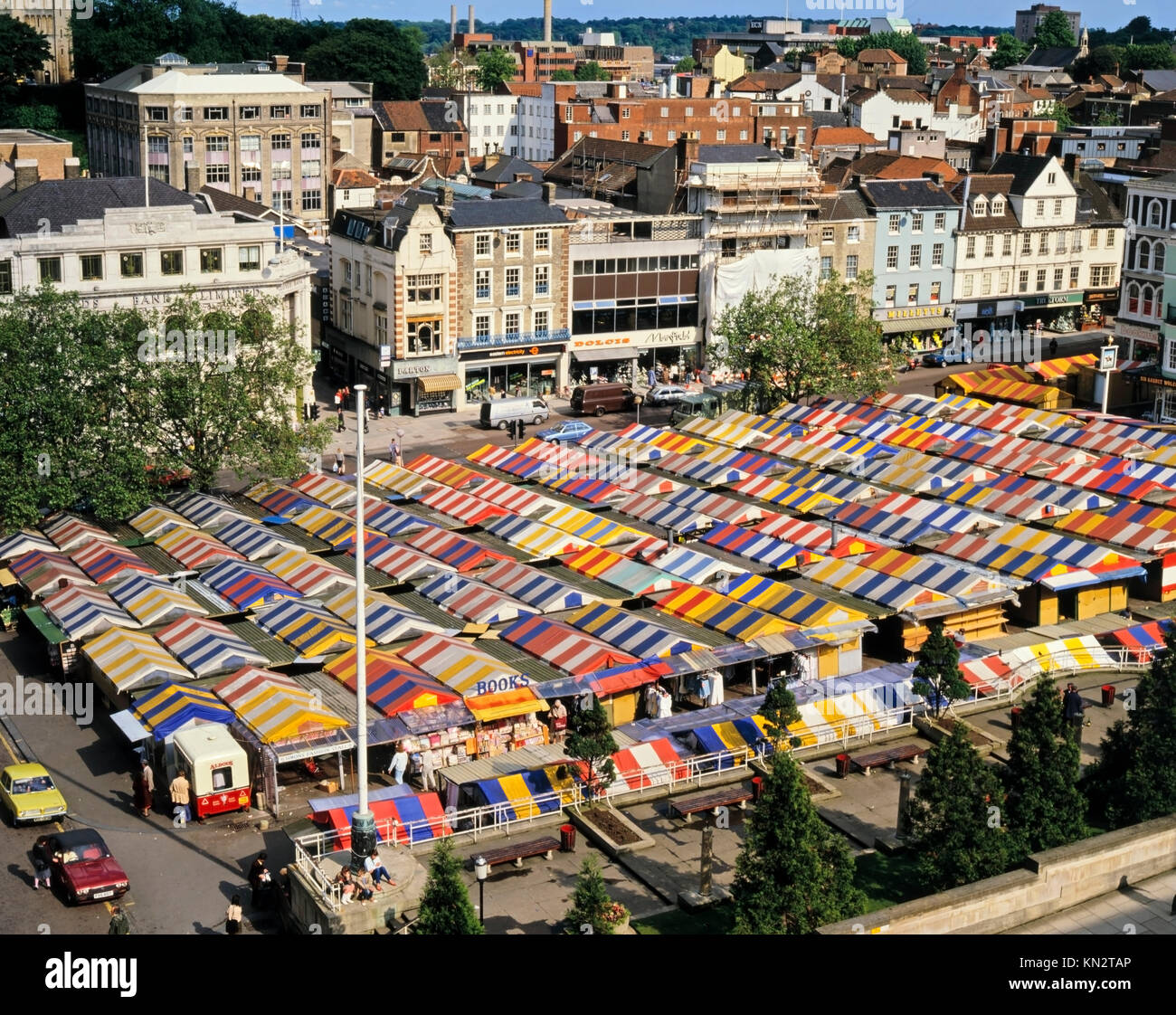 Aerial view overlooking the colourful market stall rooftops covering ...