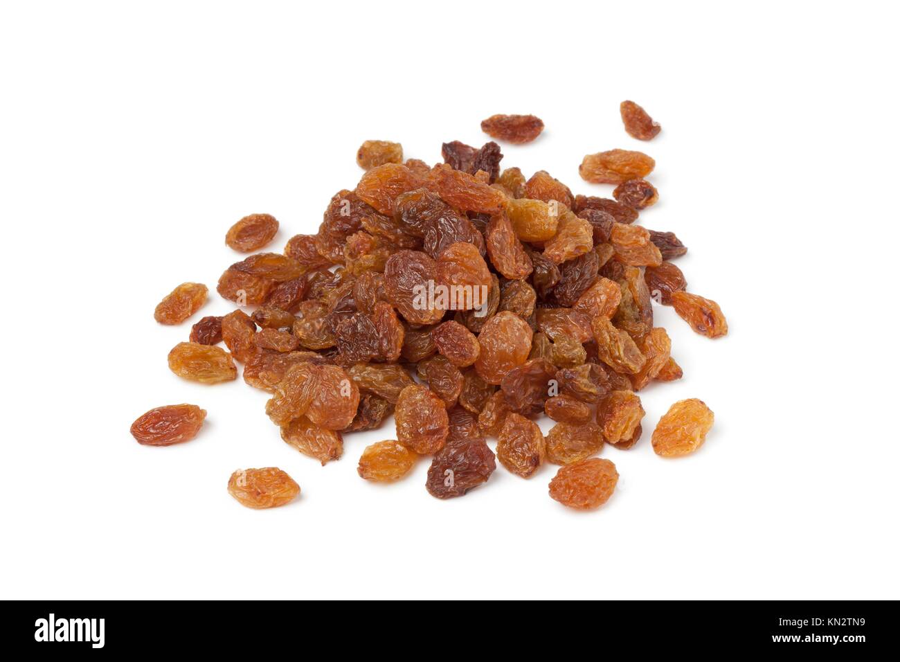Heap of brown Raisins on white background Stock Photo - Alamy