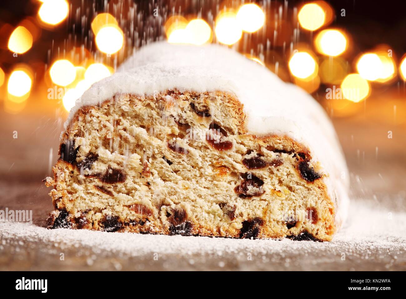 Christmas stollen and pouring sugar Stock Photo - Alamy
