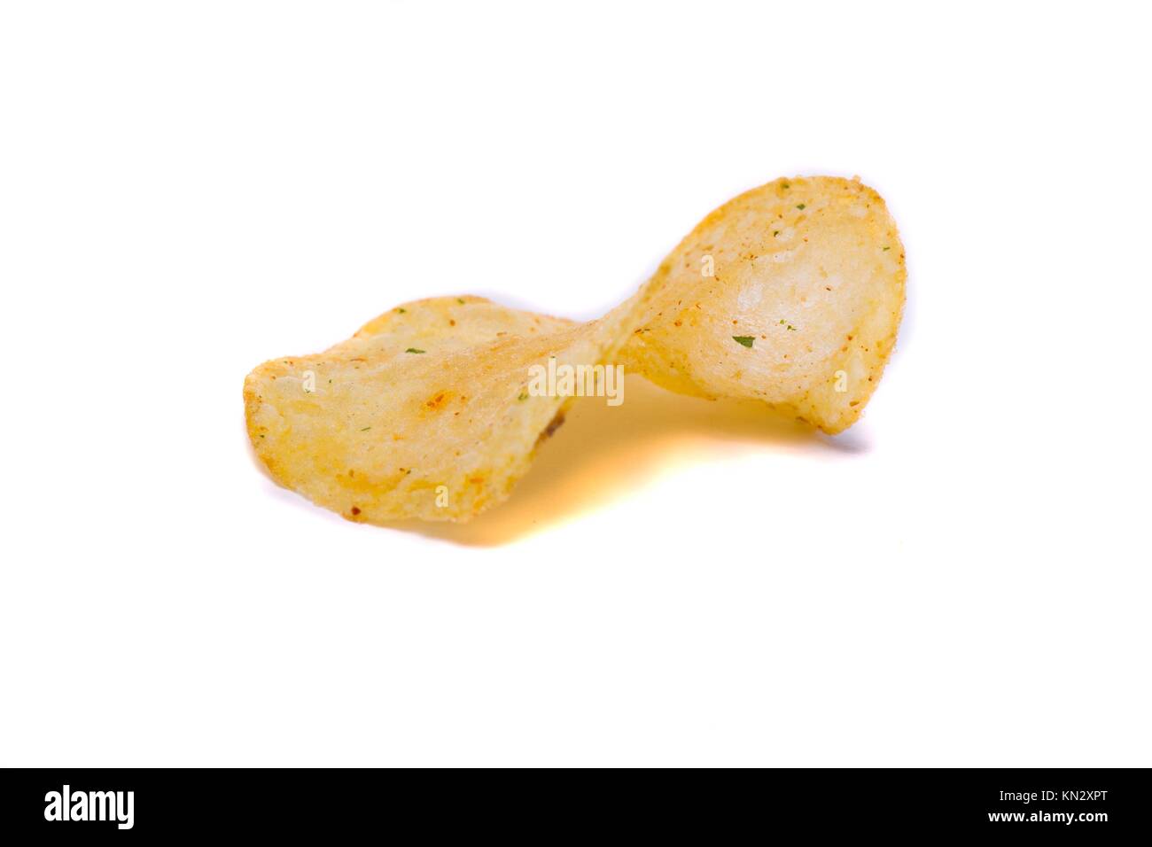 Close view of a single potato chip isolated on a white background Stock ...