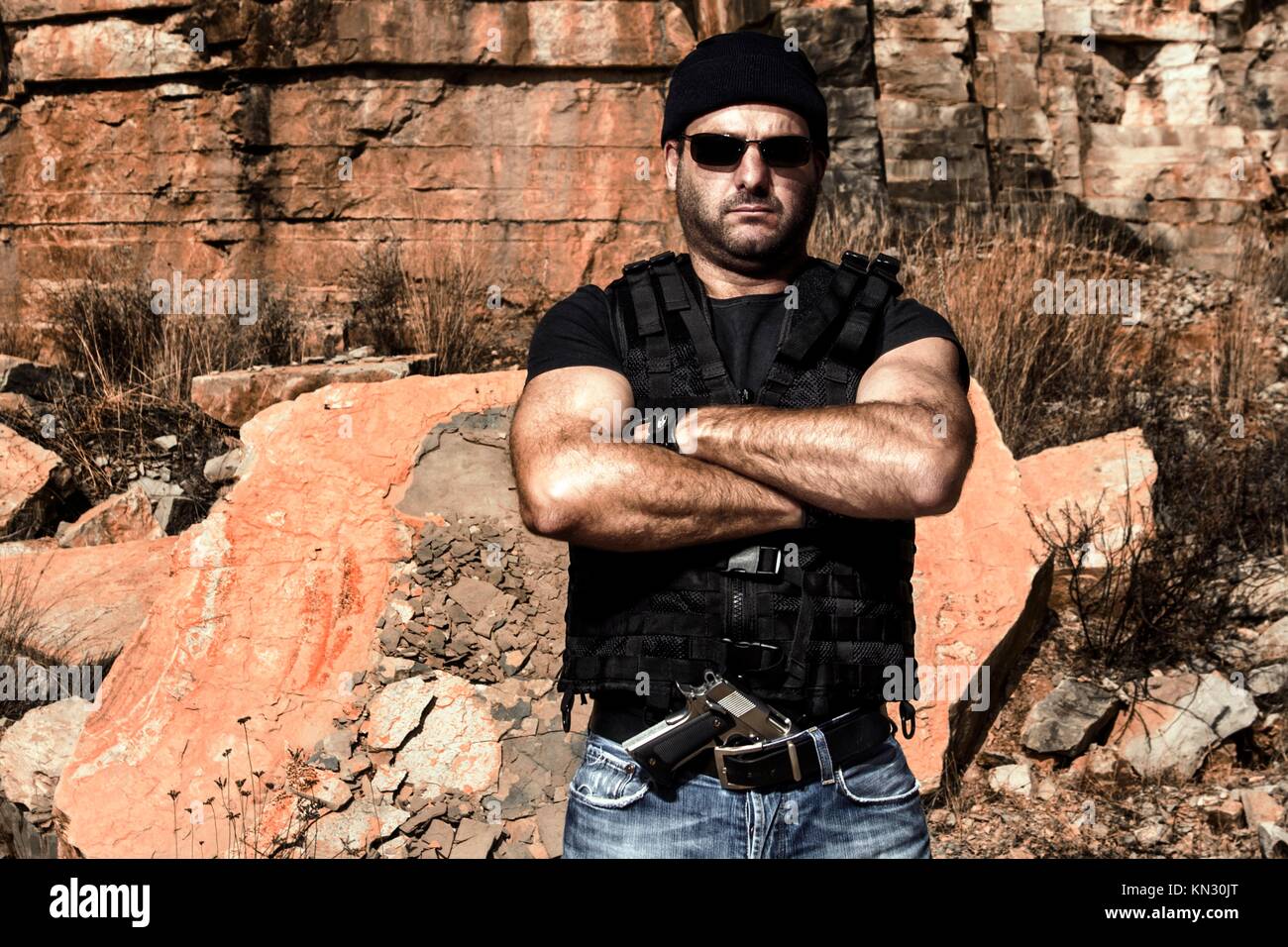 Man gun in jeans hi-res stock photography and images - Alamy
