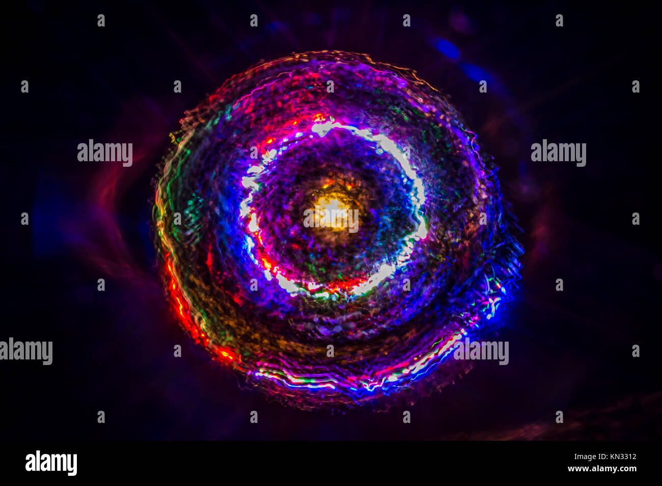 colored vortex with a golden center Stock Photo - Alamy