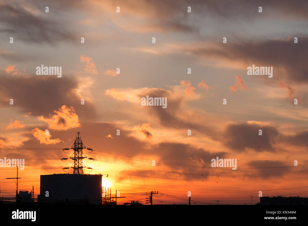 Sunrise behind buildings in urban areas, Tokyo, Japan Stock Photo - Alamy