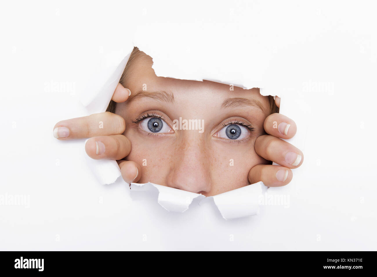 Face in hole hi-res stock photography and images - Alamy