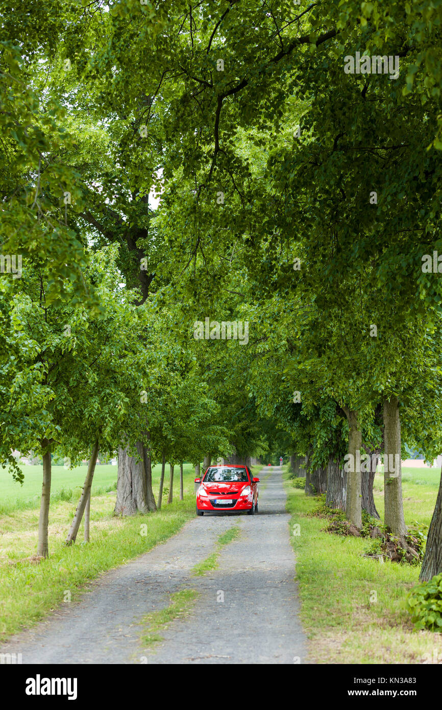 Red passenger car hi-res stock photography and images - Alamy