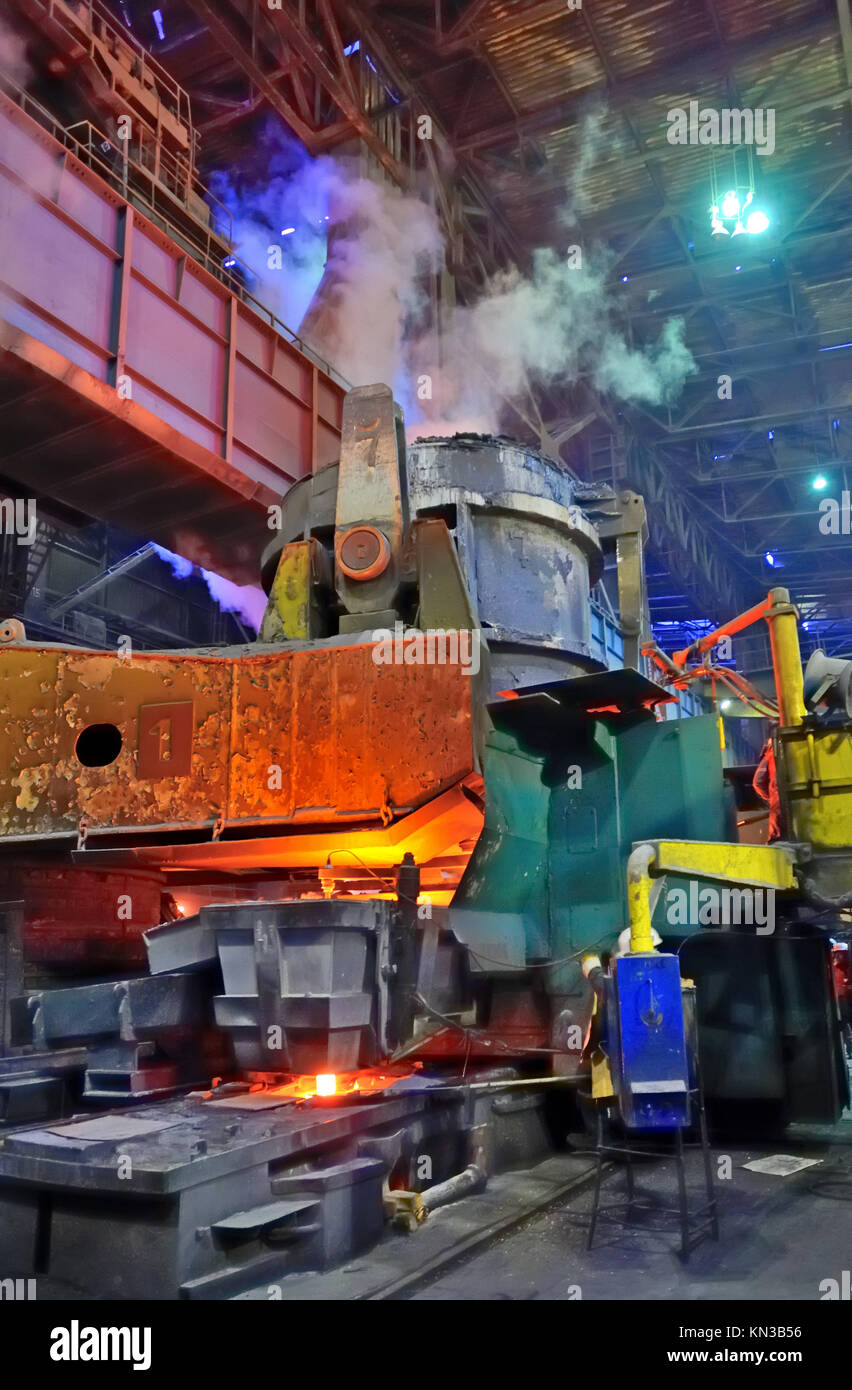Pouring of liquid metal, steel plant Stock Photo - Alamy