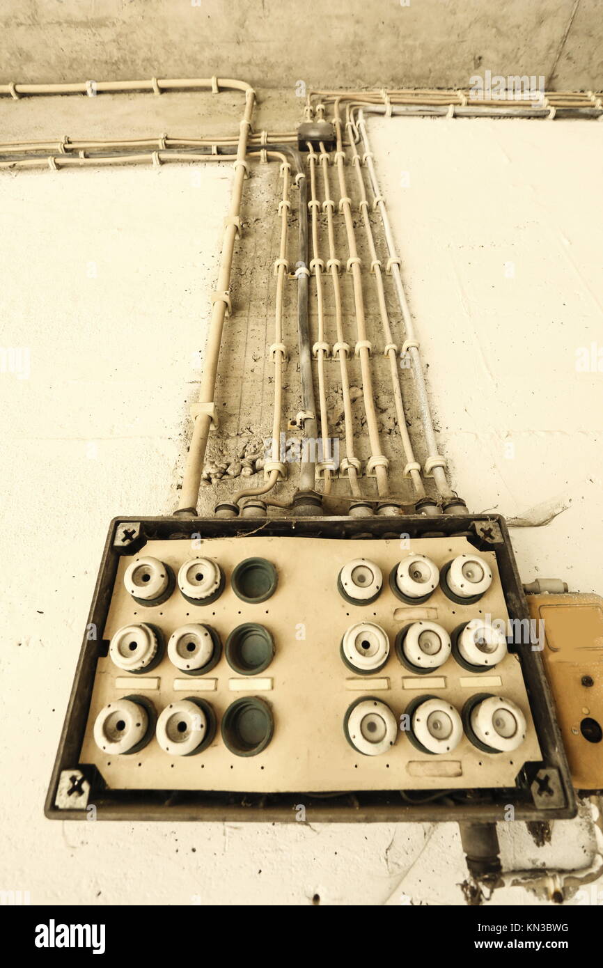 A old electricity installation with cables Stock Photo - Alamy