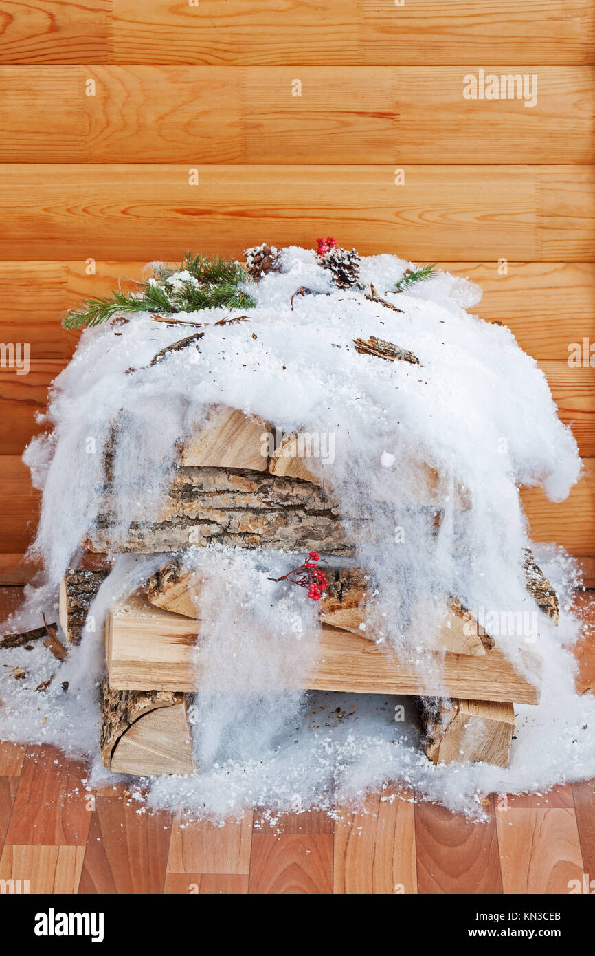 Stack of wood with Christmas decorations Stock Photo - Alamy