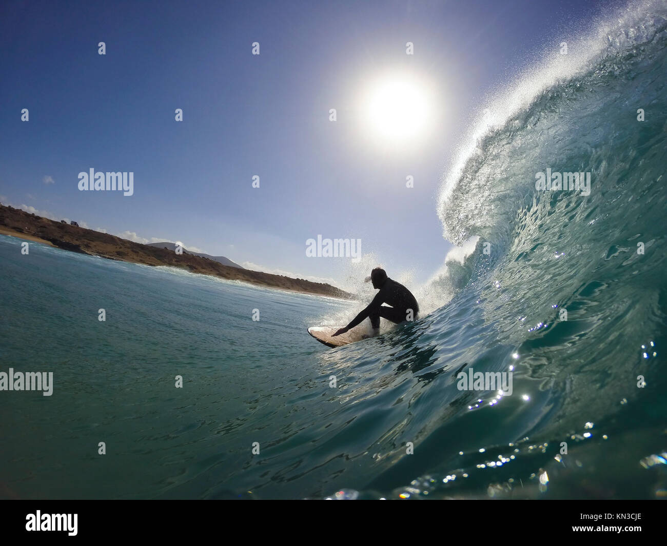 surfer in the tube of a wave Stock Photo - Alamy
