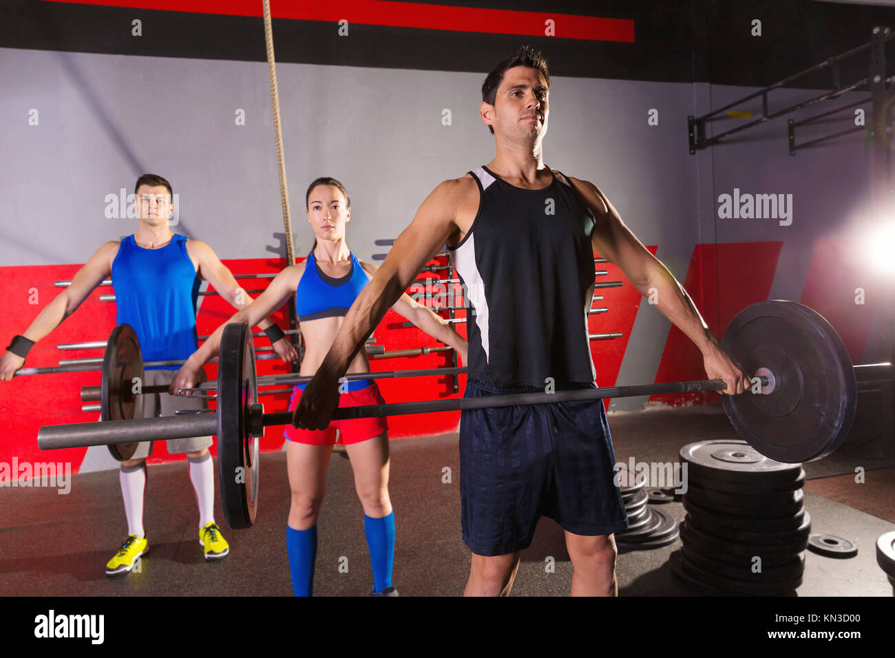 Woman lifting bar bell hi-res stock photography and images - Alamy