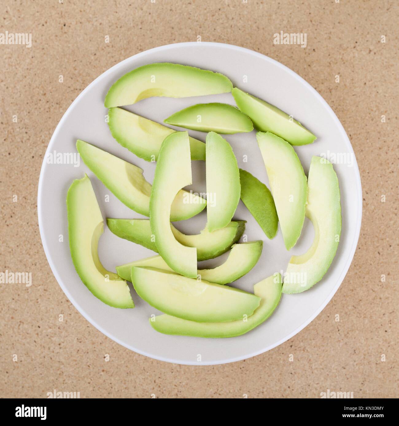 Avocado on plate hi-res stock photography and images - Alamy