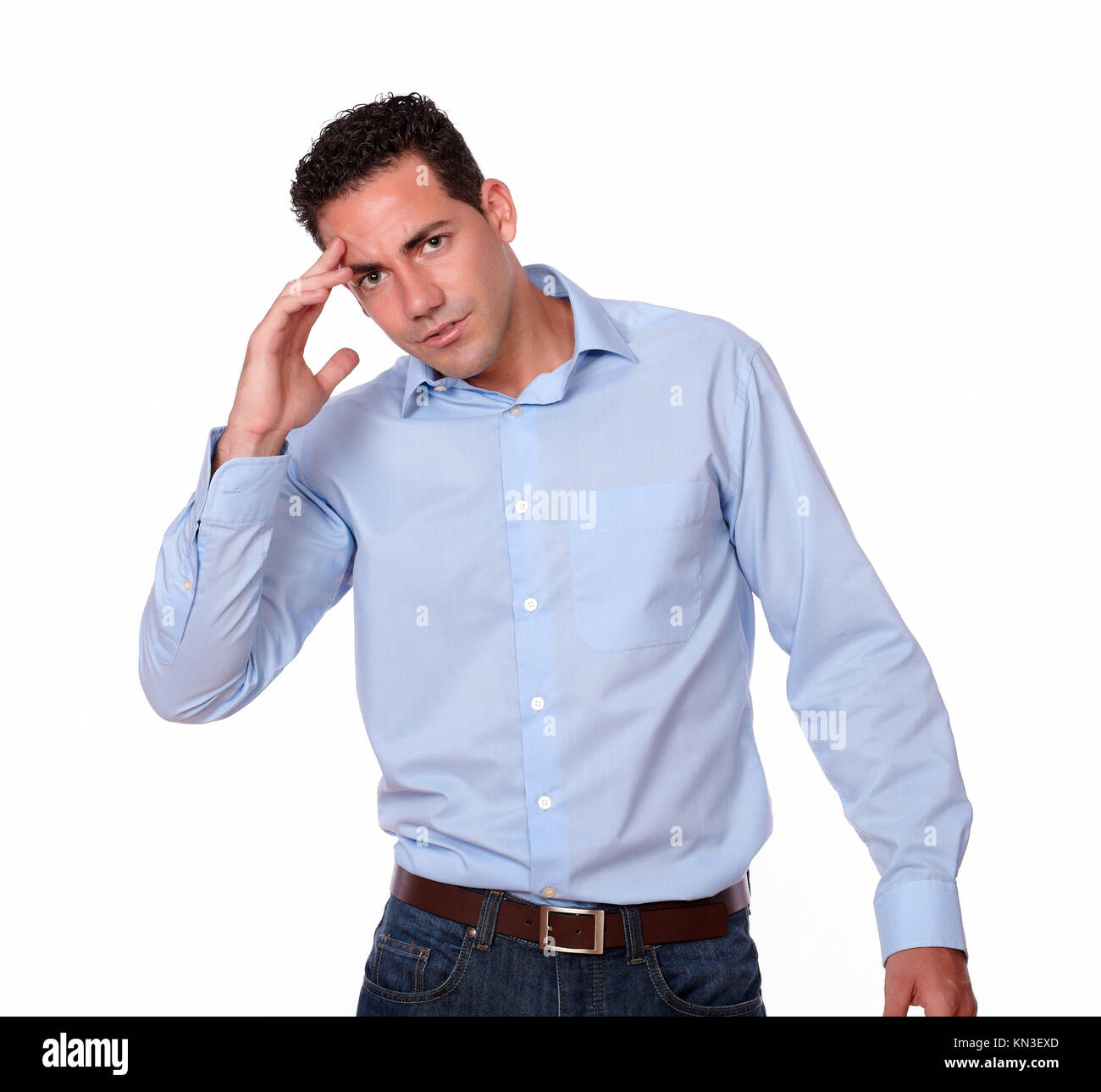 Portrait of a stress young man with head pain standing while is looking ...