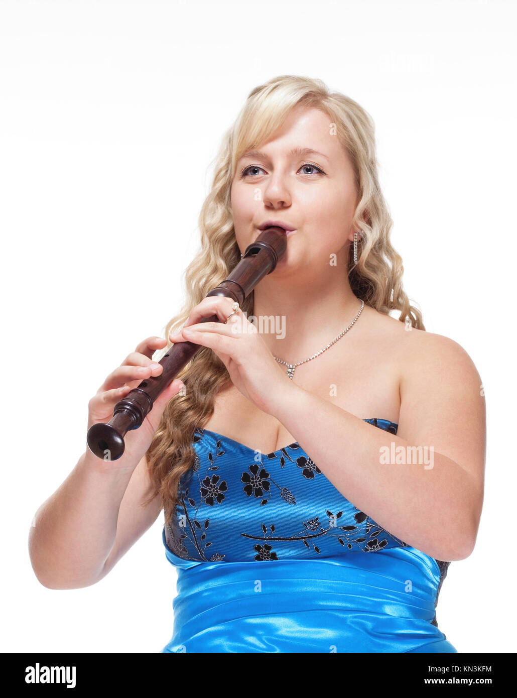 Young woman playing flute hi-res stock photography and images - Alamy