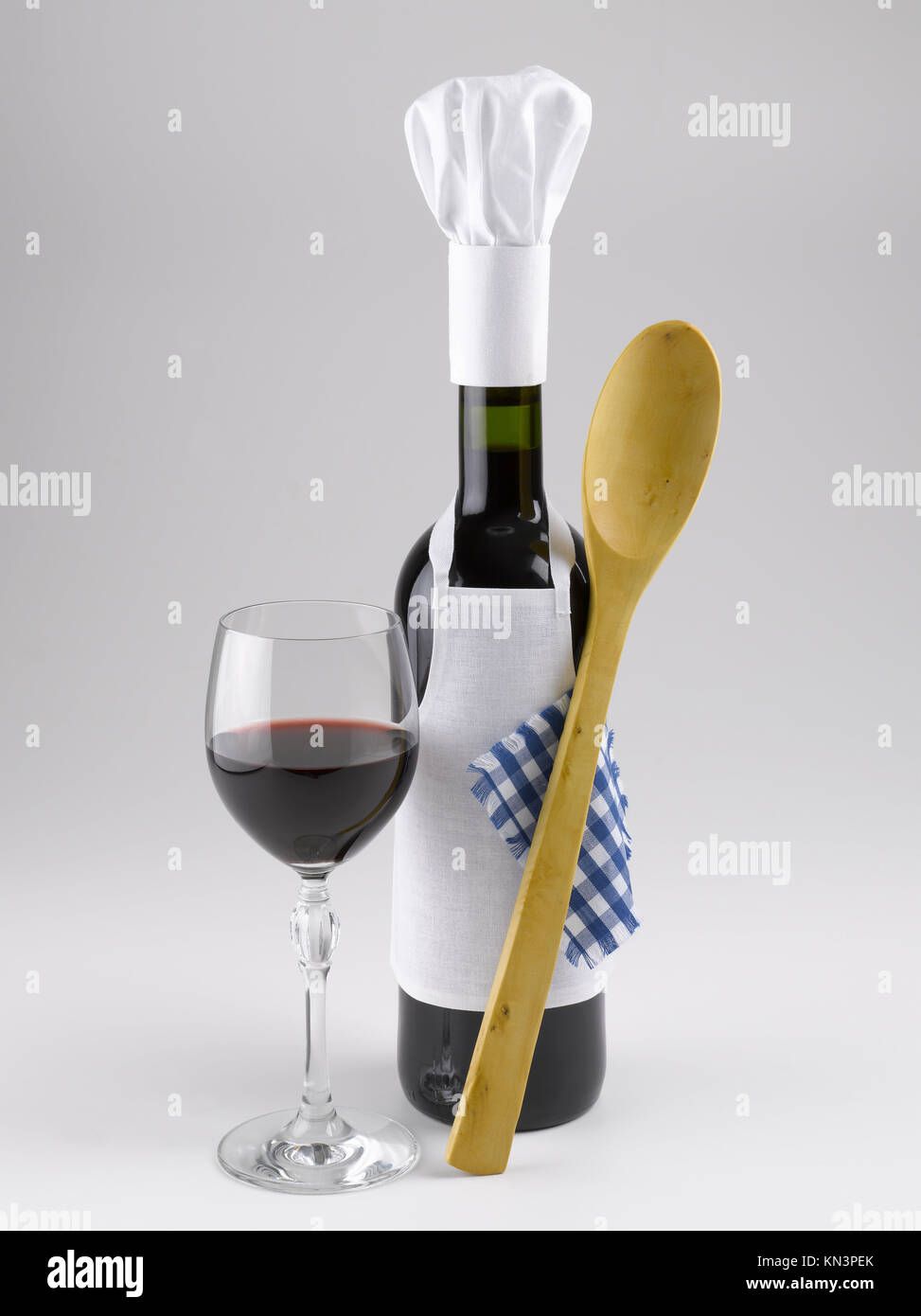 Wine bottle dressed in chef Stock Photo - Alamy