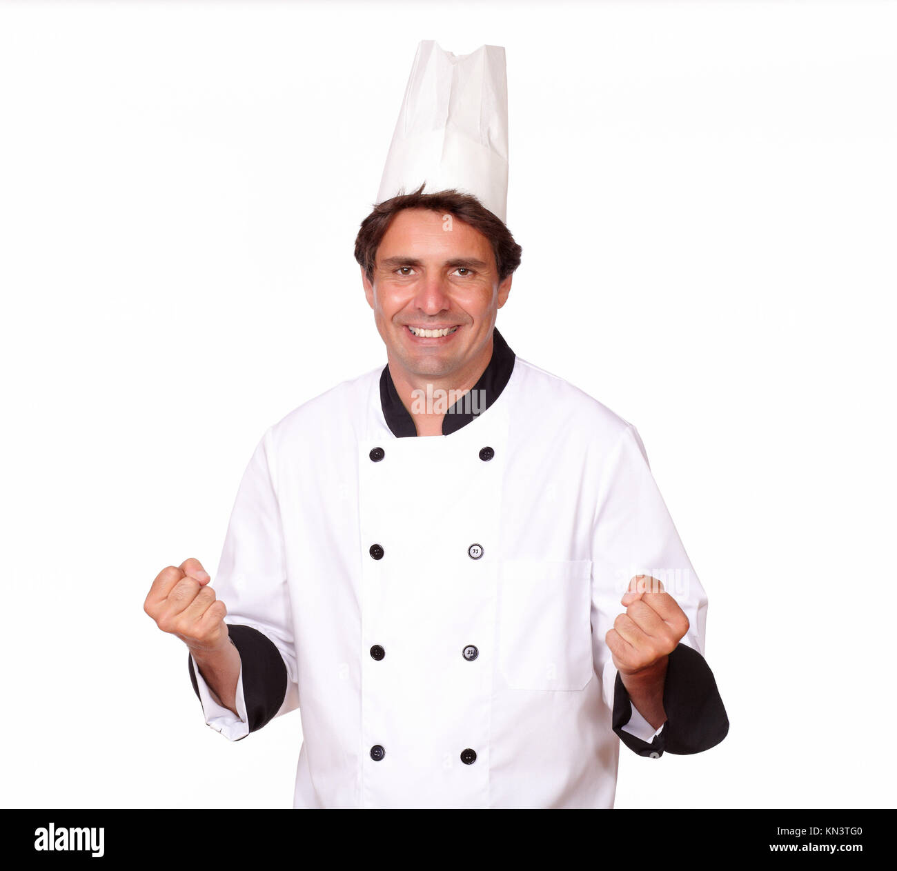 Portrait of a charismatic male cook celebrating a victory on white ...
