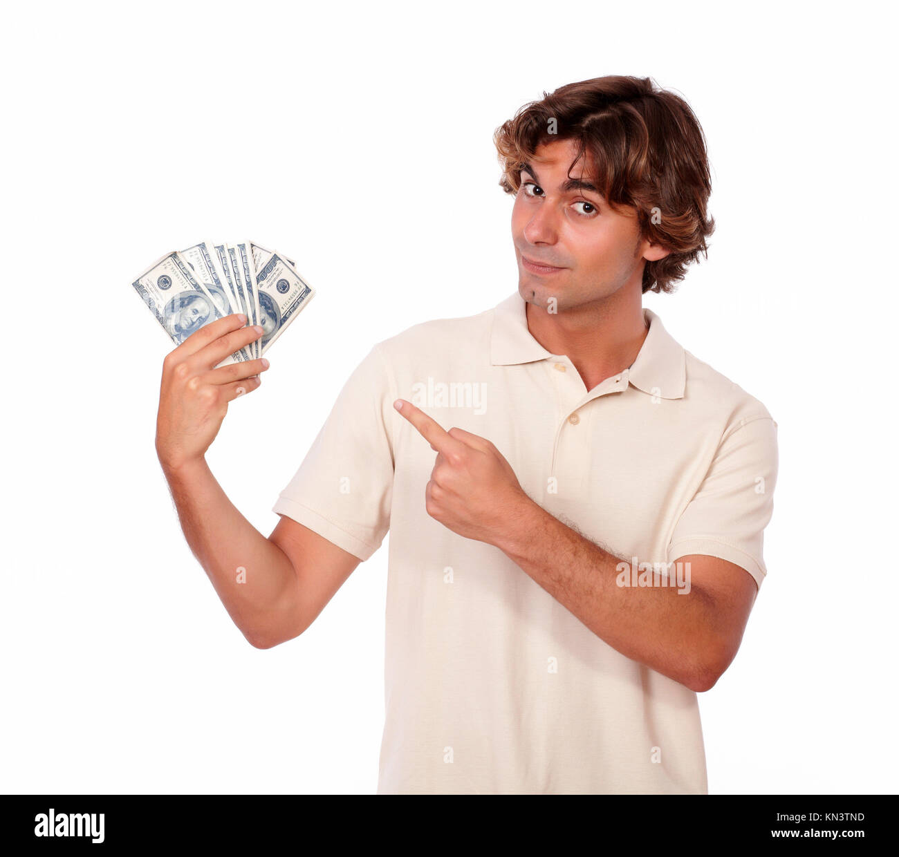 Portrait of a handsome young man holding cash money on white background ...