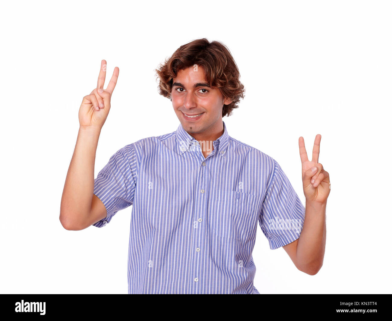 Portrait of a handsome young man showing you victory sign on isolated ...